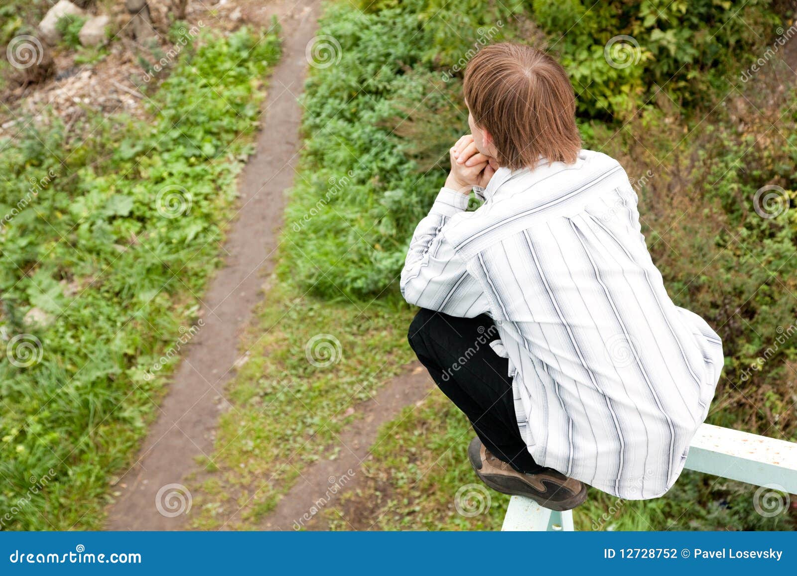 Man Guy is Sitting on the Bridge Edge Stock Photo - Image of risk ...
