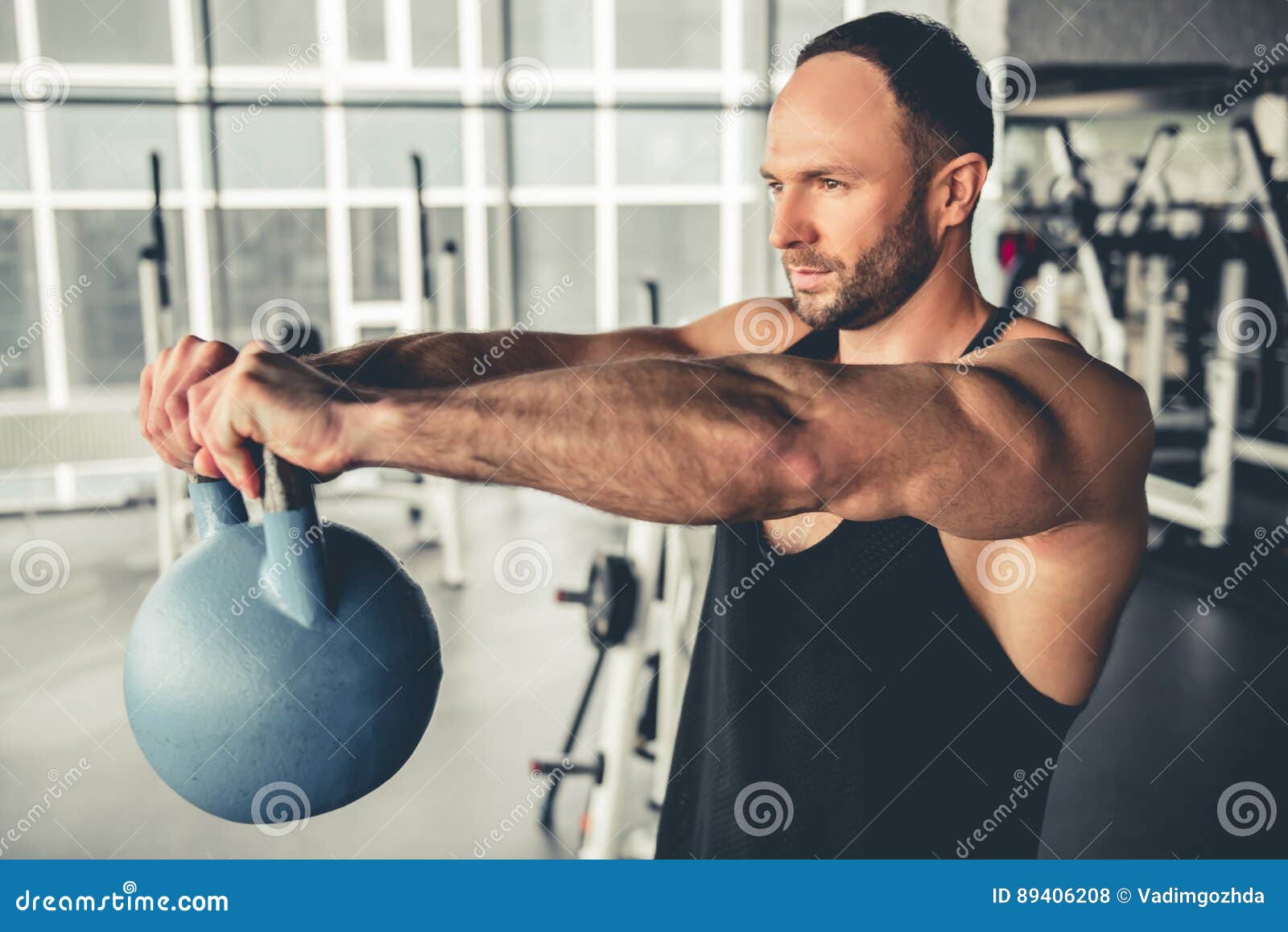 Man at the gym stock photo. Image of athletic, serious - 89406208
