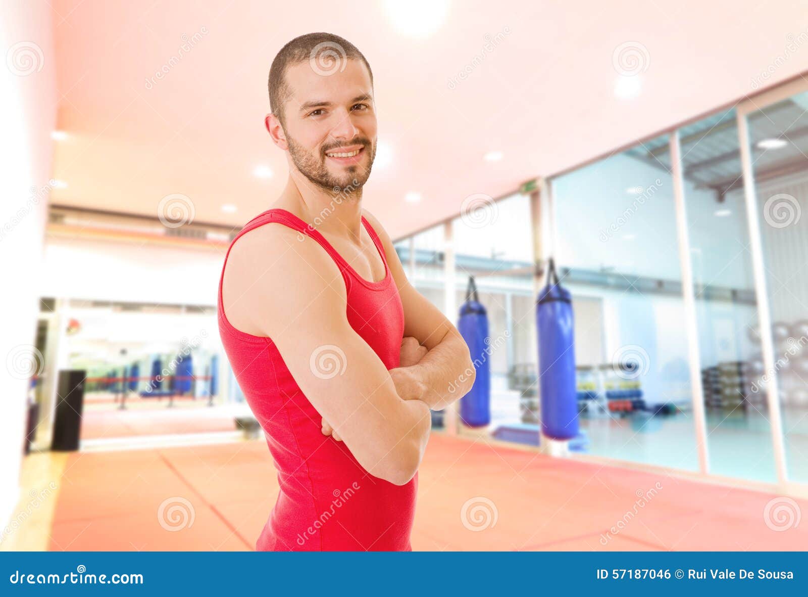 Man at the gym stock photo. Image of happy, isolated - 57187046