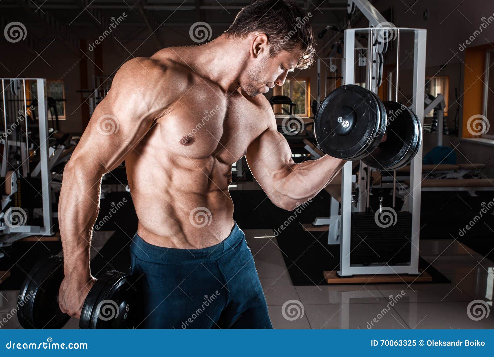 Man at the gym. stock image. Image of raise, elevations - 70063325