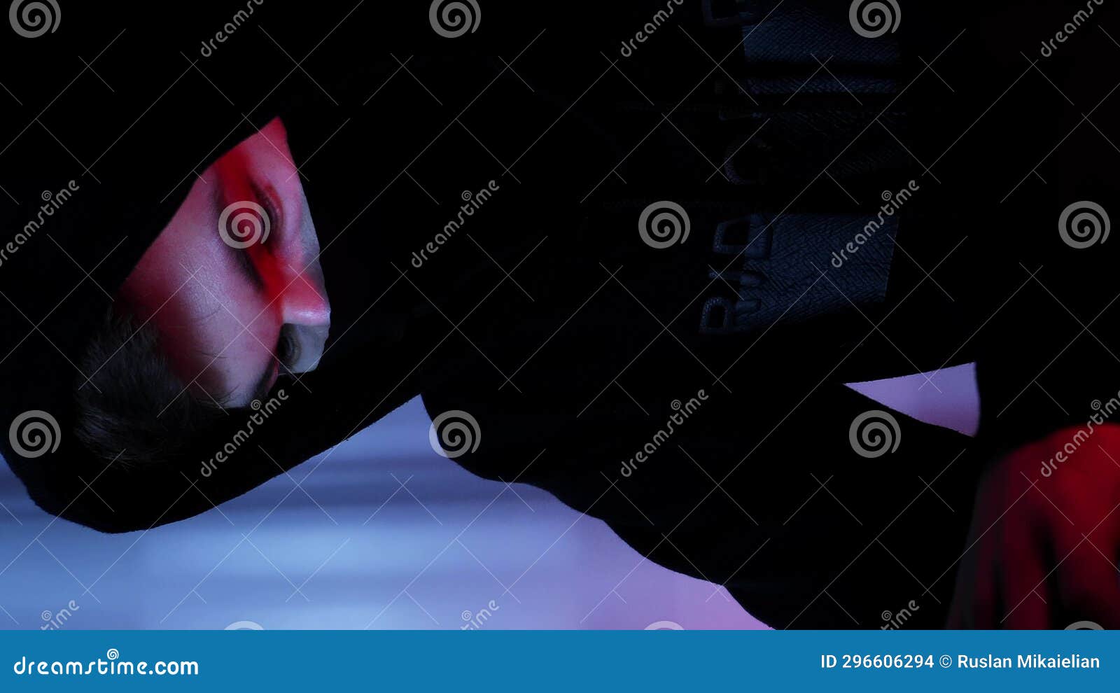 Man Hacker Face in Black Mask and Hood Looking at Computer Screen ...