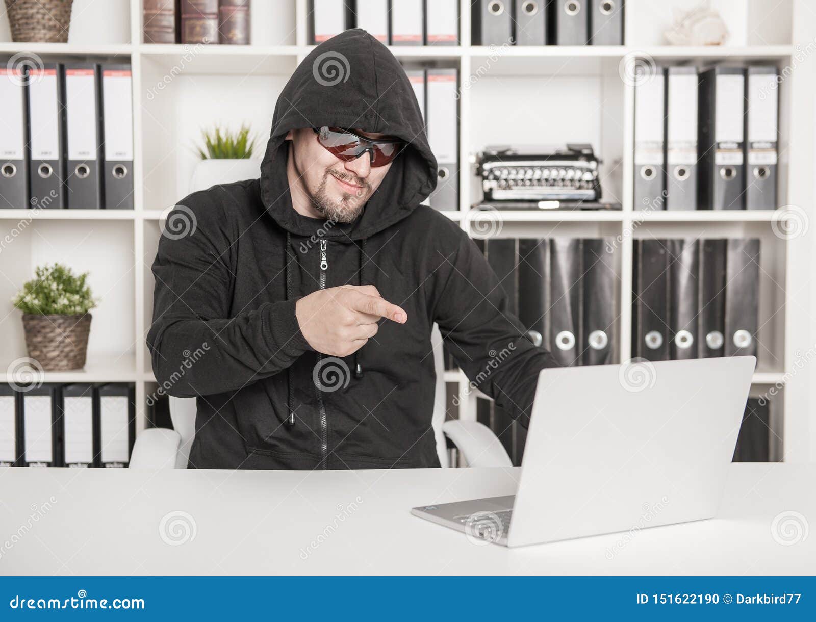 Man Hacker Using Laptop in Office Stock Photo - Image of background ...