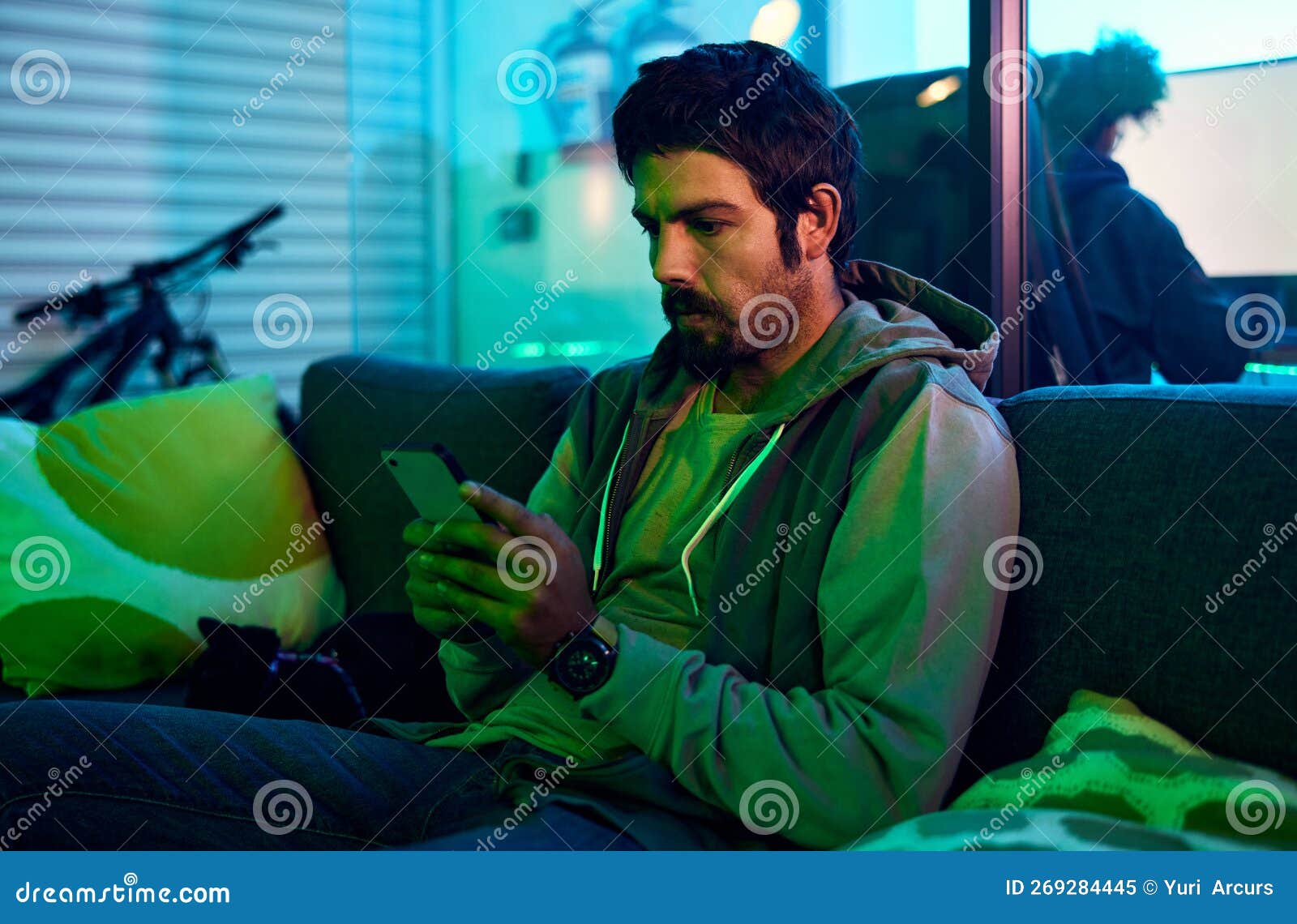 Man, Hacking or Phone Typing in Neon Garage on Cybersecurity App, Software Programming or ...