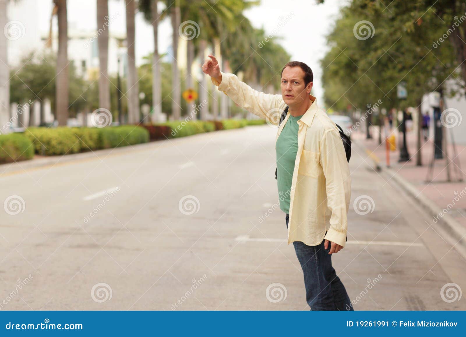 Man hailing a cab stock image. Image of street, balding - 19261991