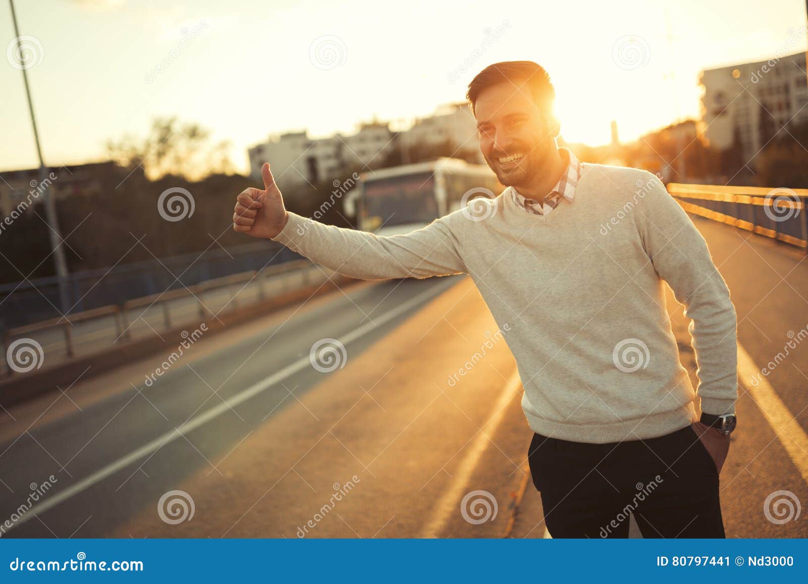 Man Hailing a Cab in Sunset Stock Image - Image of young, adult: 80797441