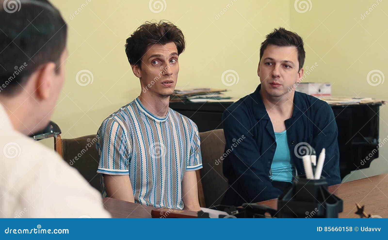 Man in Hair Net Angry Explaining Two Visitors at Office Meeting Stock ...