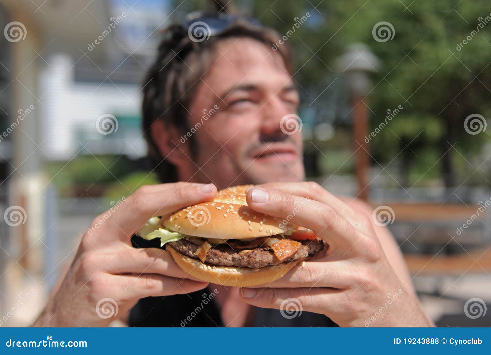Man and hamburger stock photo. Image of diner, meat, restaurant - 19243888