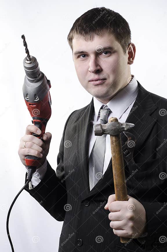 A Man with a Hammer and Drill Stock Image - Image of hammer, working ...