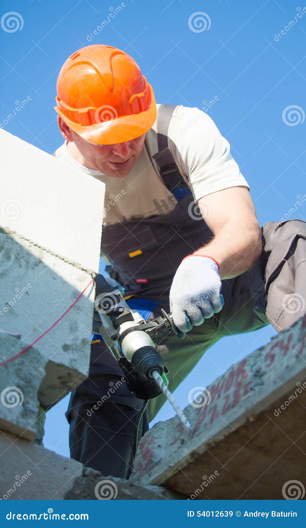 Man with hammer drill stock image. Image of instrument - 54012639