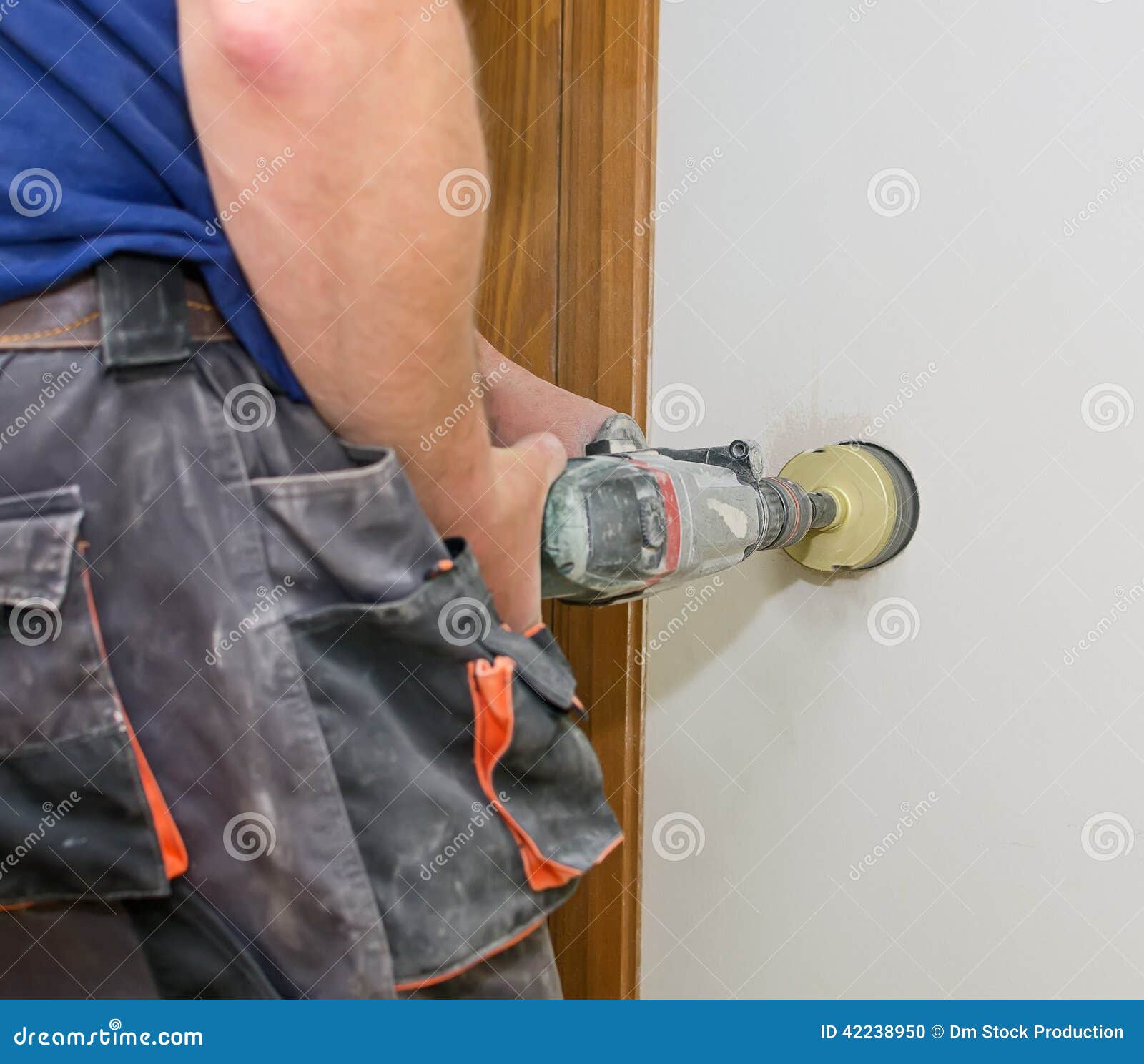 Man with hammer drill stock photo. Image of hole, instrument - 42238950