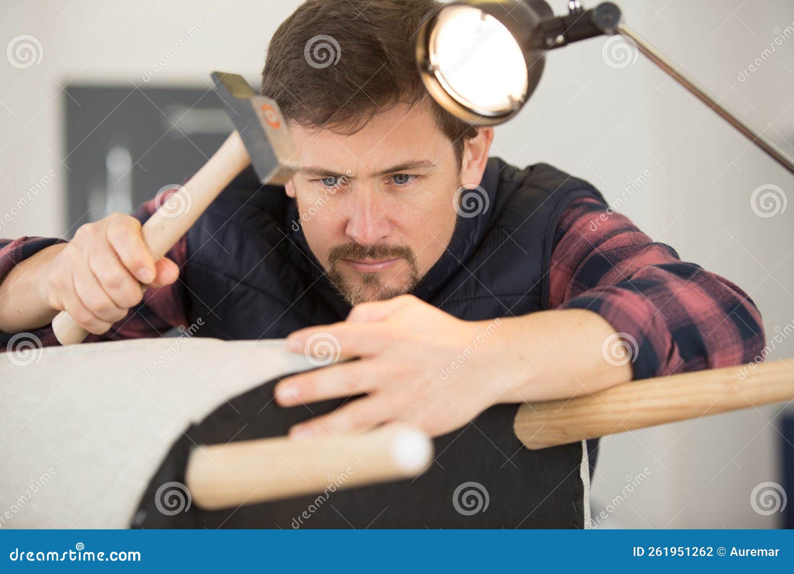 Man Hammering Tacs into Chair Base Stock Photo - Image of cloth, casual ...