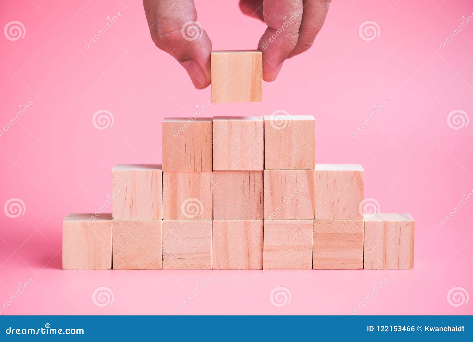 Man Hand Building Stack of Wood Cube Building Blocks Stock Photo ...