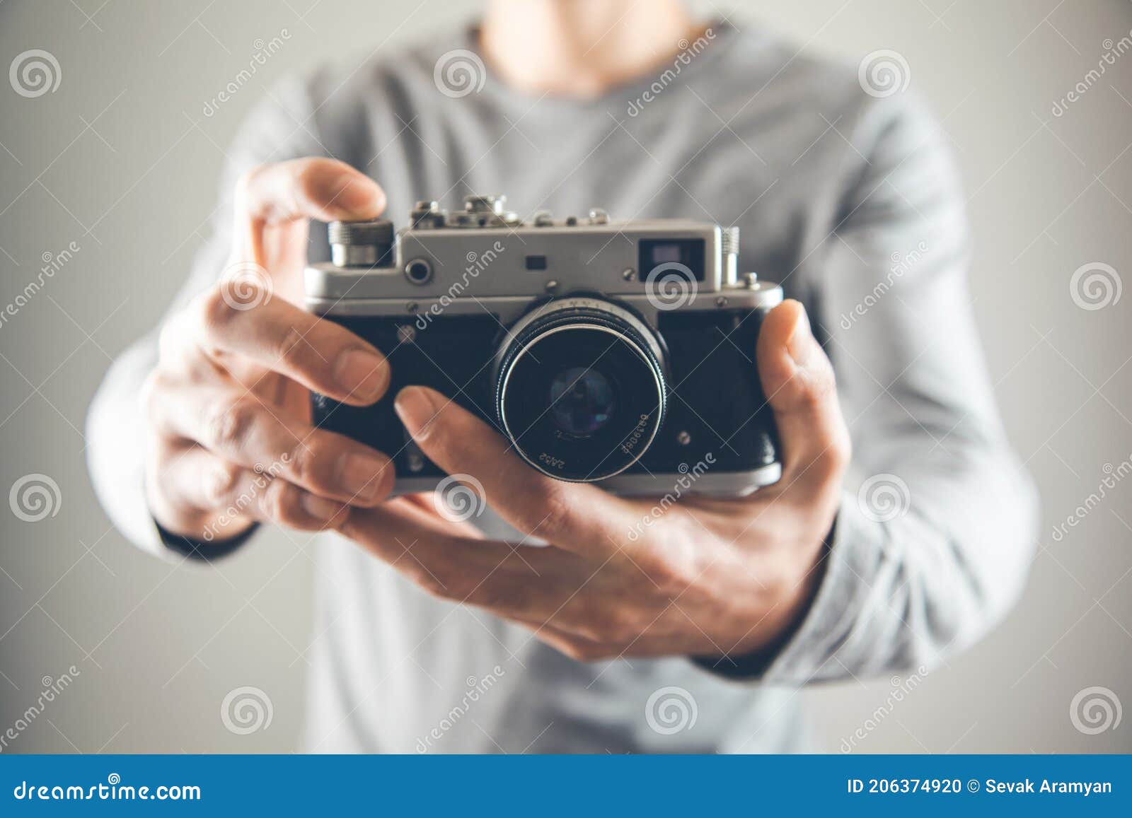 Man hand camera stock photo. Image of lens, retro, adult - 206374920