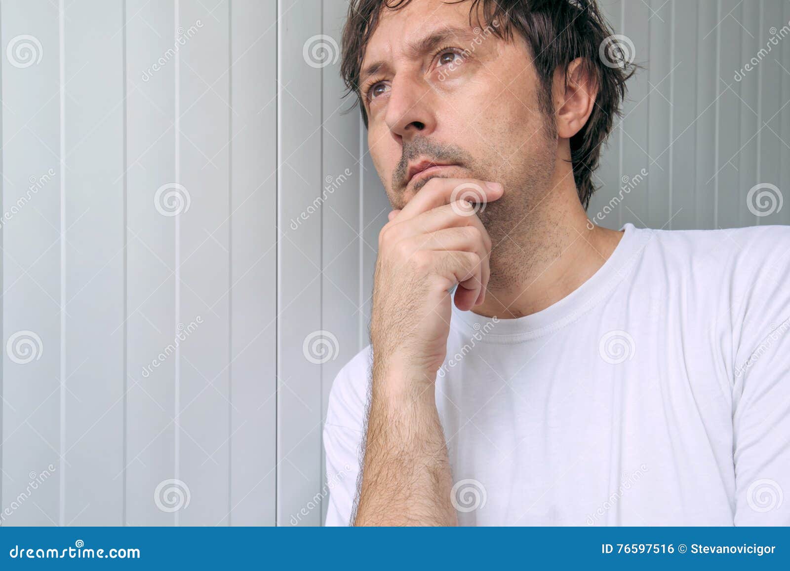 Man with Hand on Chin Thinking Deep Thoughts Stock Photo - Image of ...