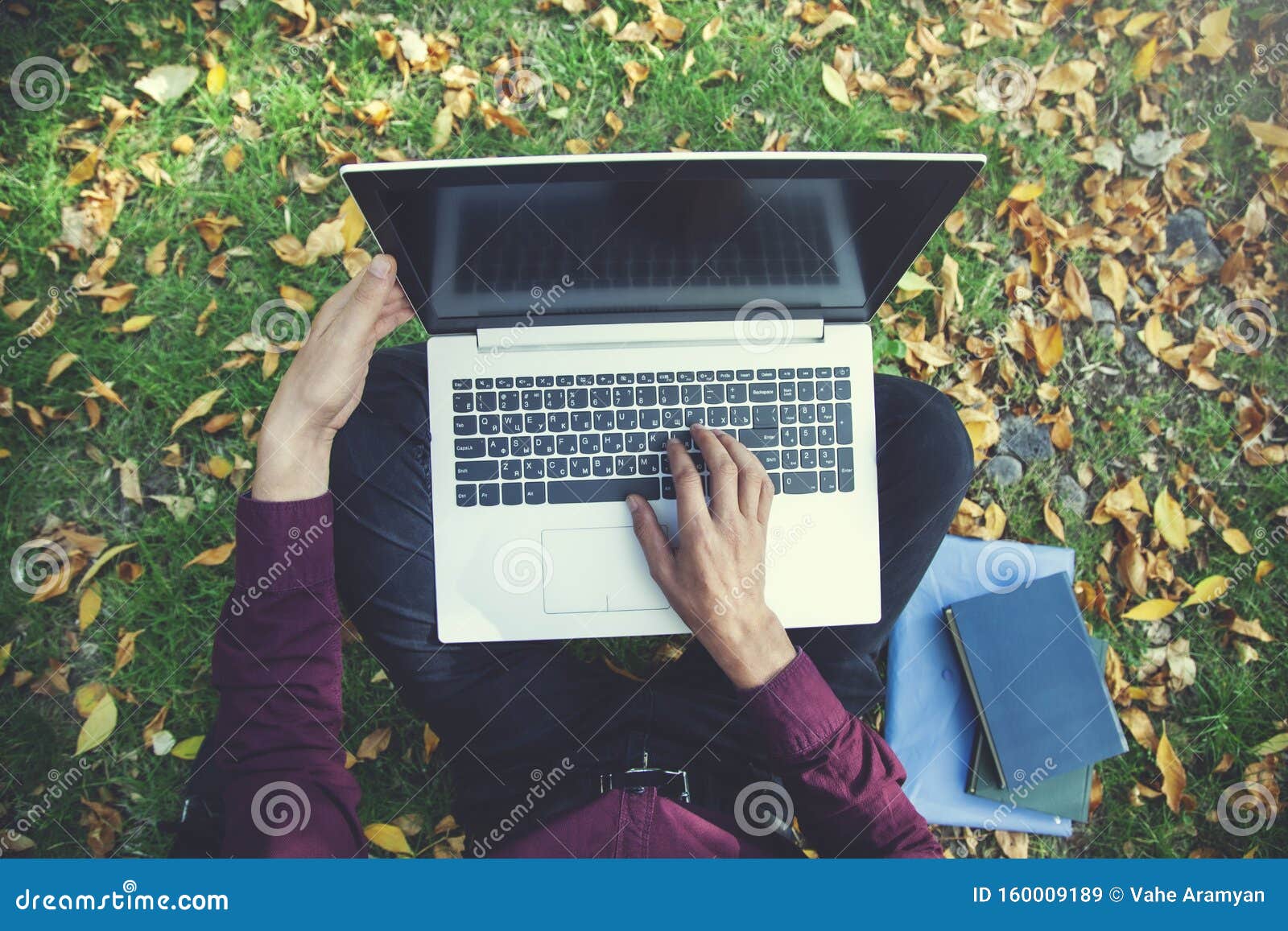 Man Hand Computer Sitting on Grass Stock Image - Image of notebook ...