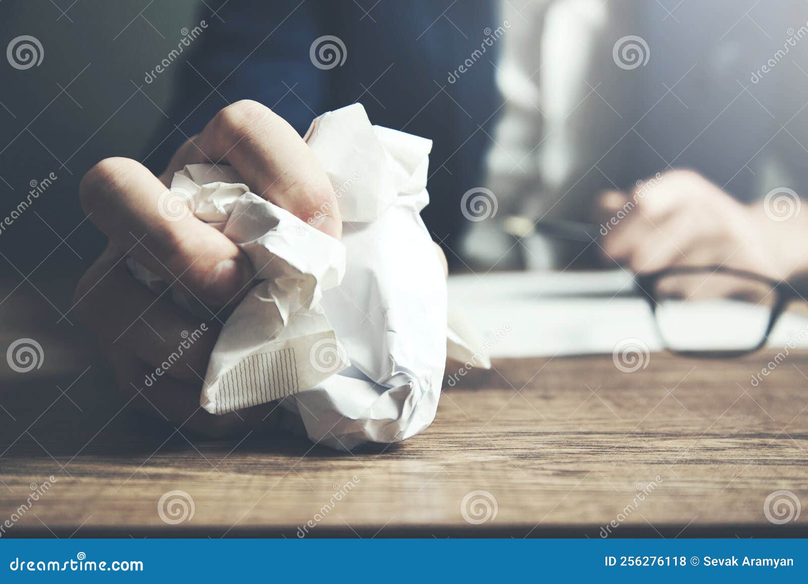 Man hand crumpled paper stock photo. Image of hand, background - 256276118