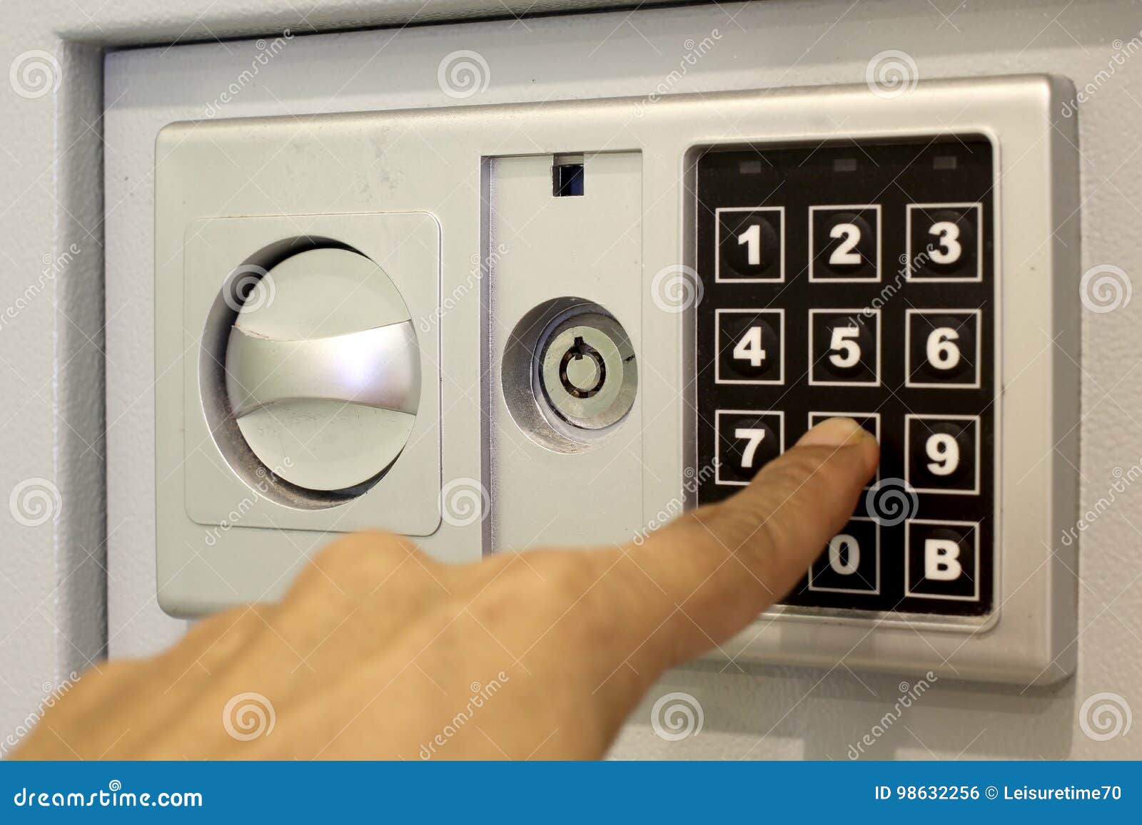 Man Hand Entering Code on of Safe Box Stock Photo - Image of male ...