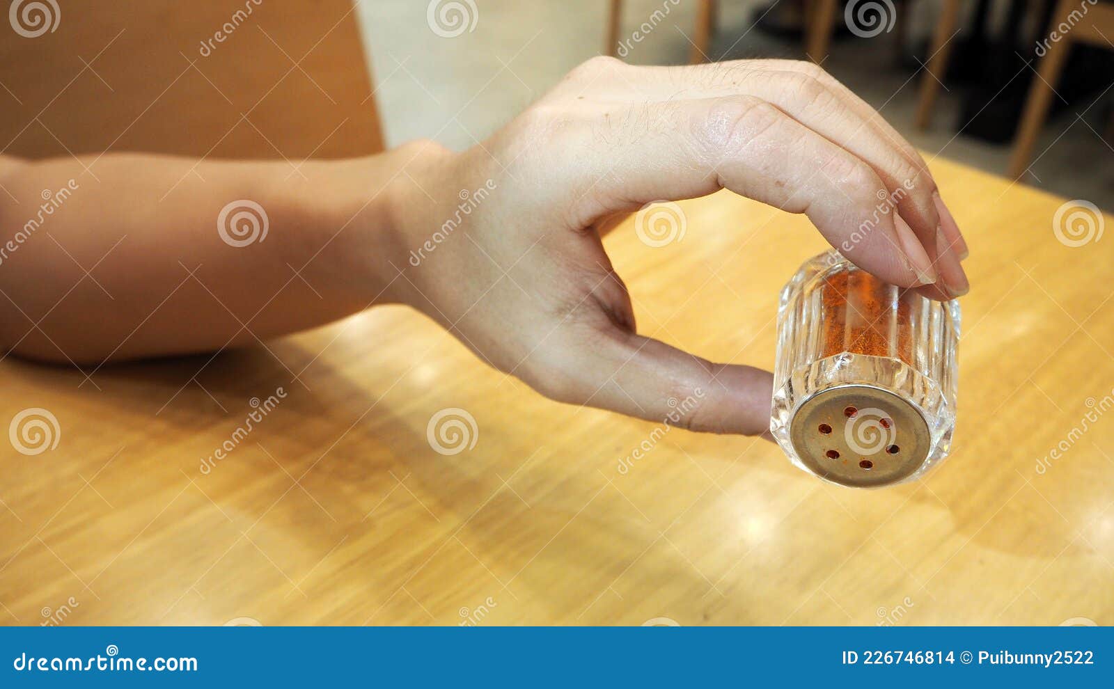 Man Hand Grab a Little Bottle of Cayenne Pepper Stock Photo - Image of ...