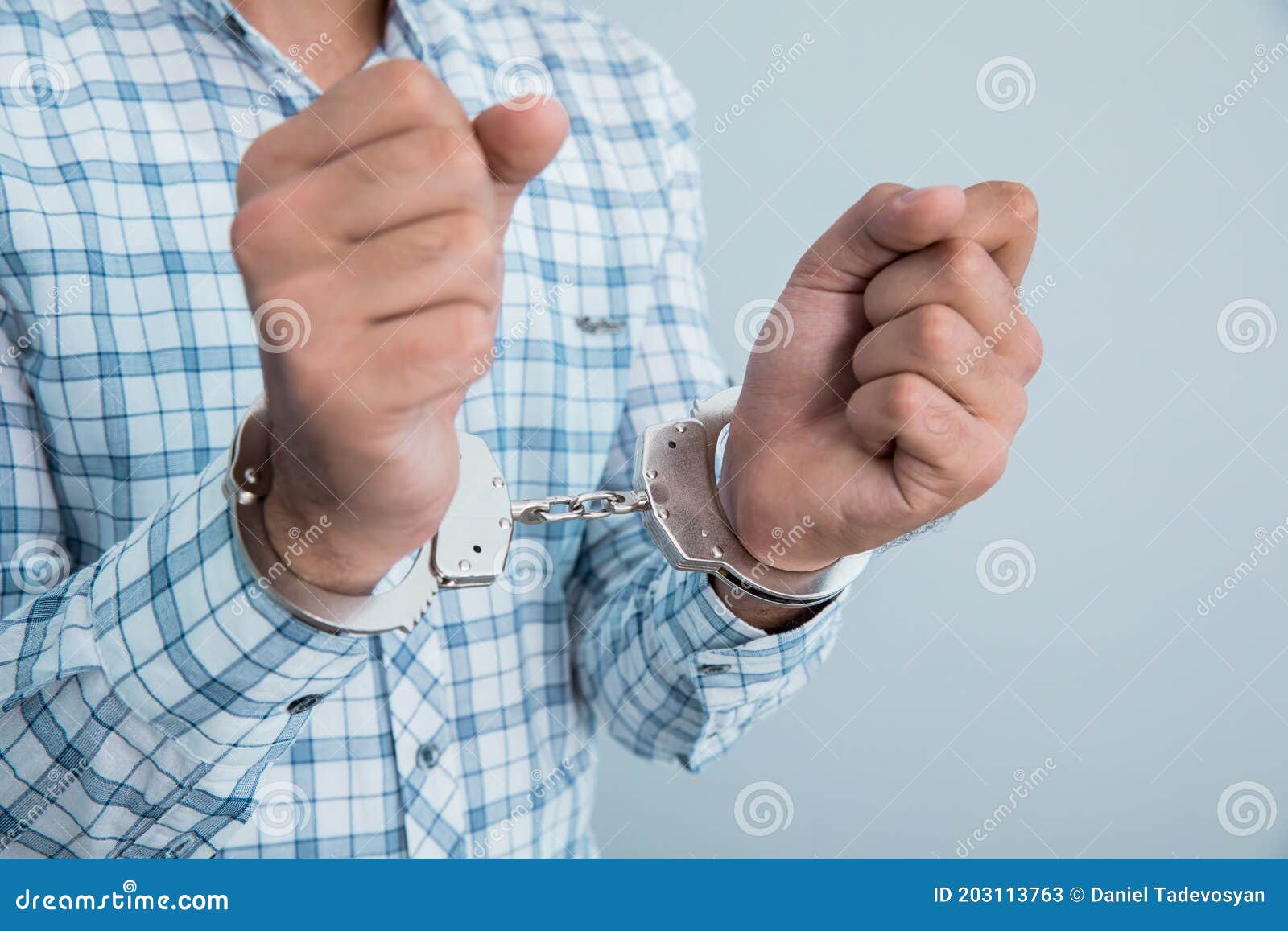Man hand handcuffs stock image. Image of police, prisoner - 203113763