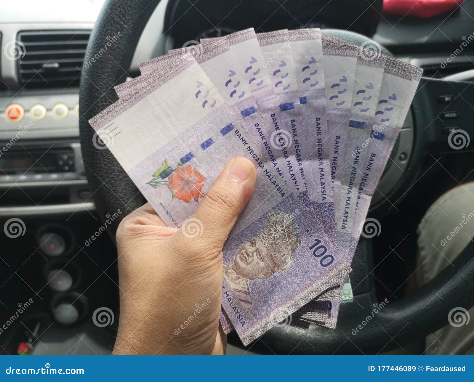 Man Hand Hold One Hundred Ringgit Malaysia Bills. Stock Image - Image ...