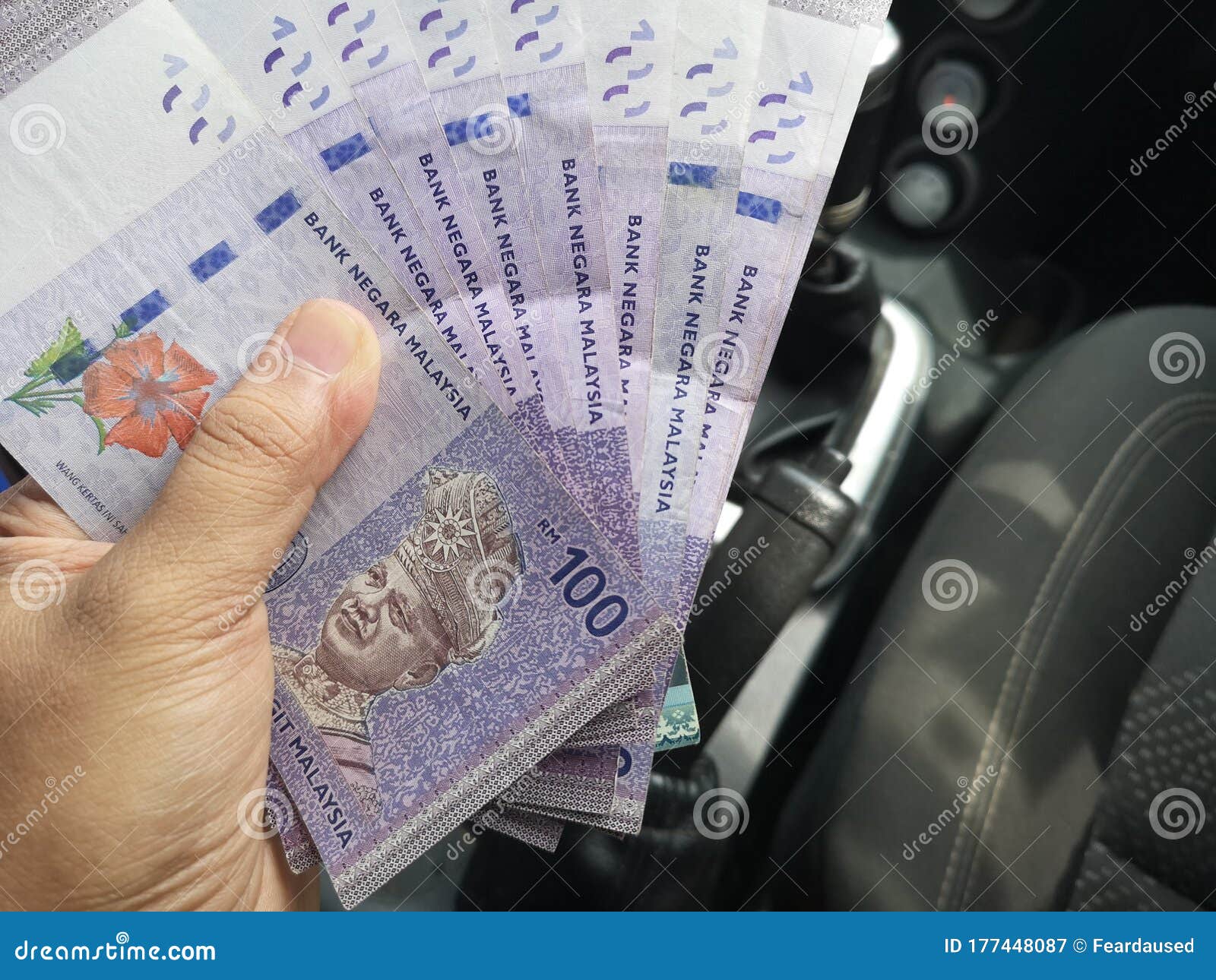 Man Hand Hold One Hundred Ringgit Malaysia Bills. Stock Image - Image ...