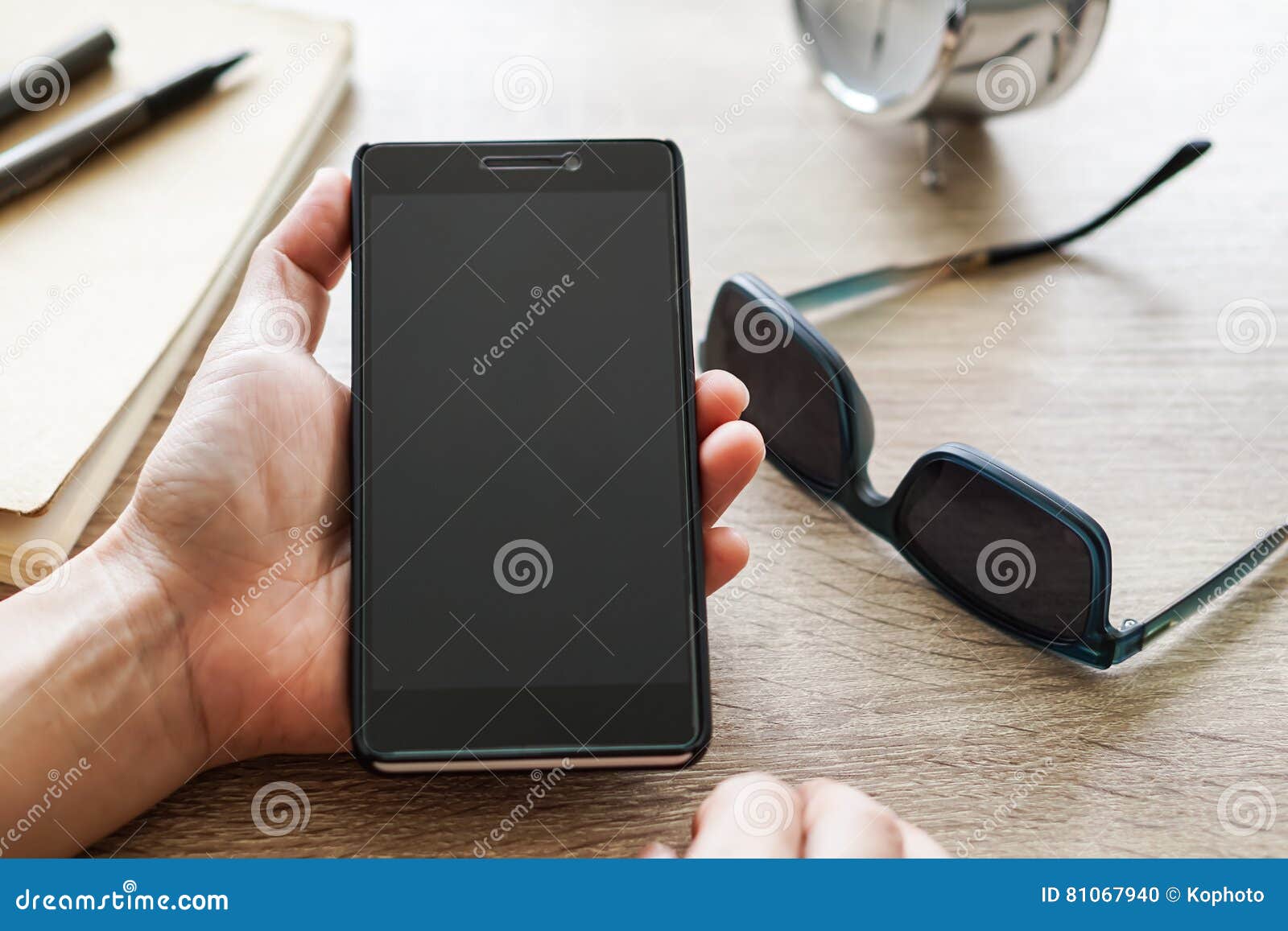 Man Hand Holding the Black Smartphone Stock Photo - Image of indoor ...