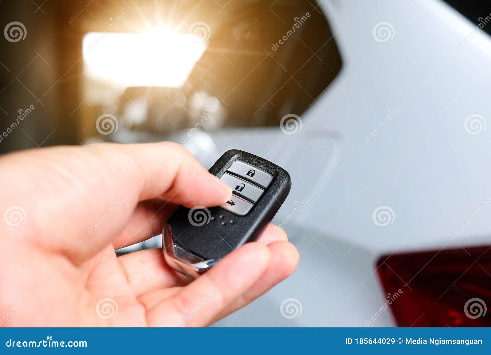 Man Hand Holding the Car Remote, he Push the Remote Control To Open the ...