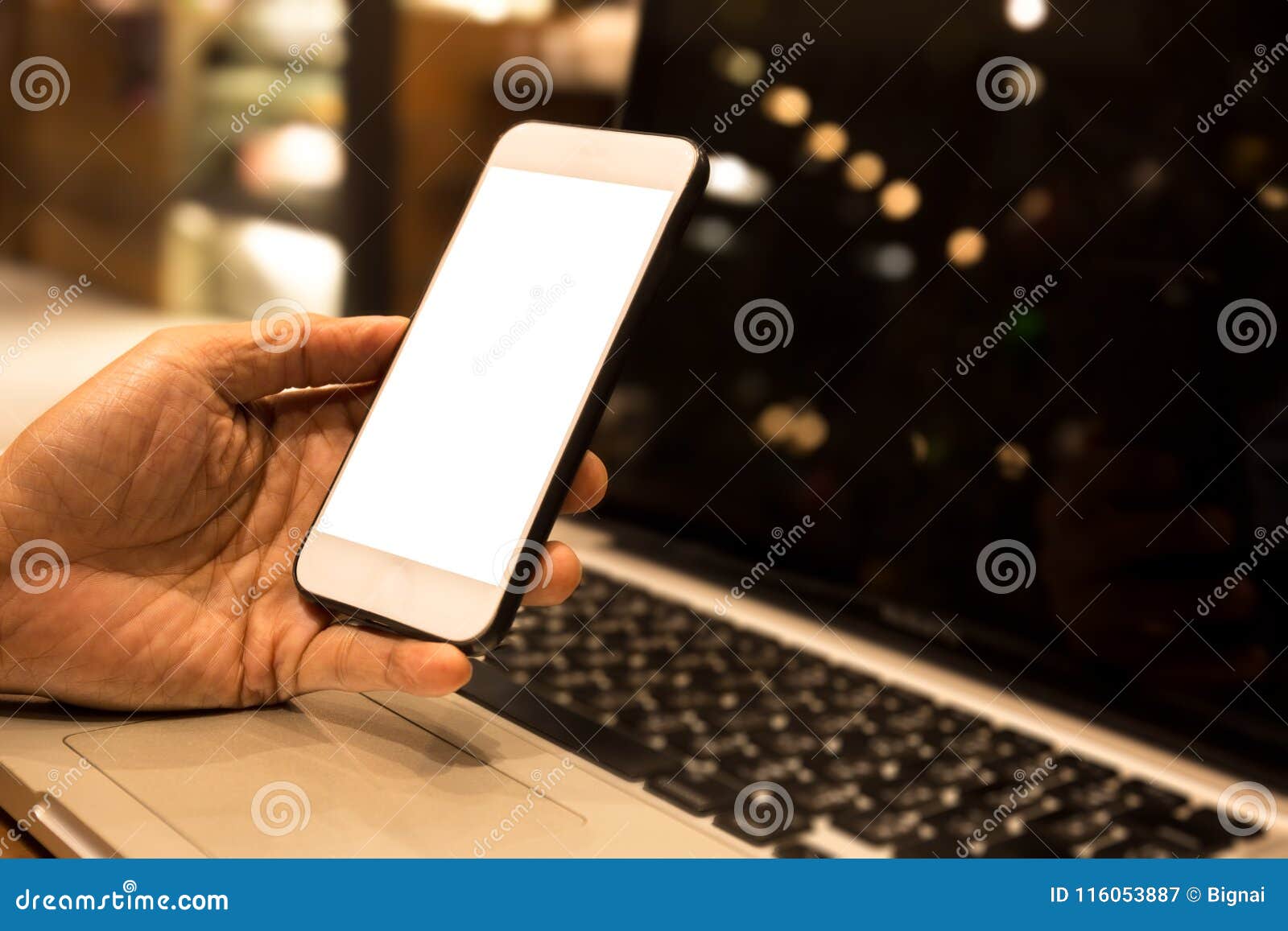 Man Hand Holding Cell Phone White Screen Over Laptop Stock Image ...