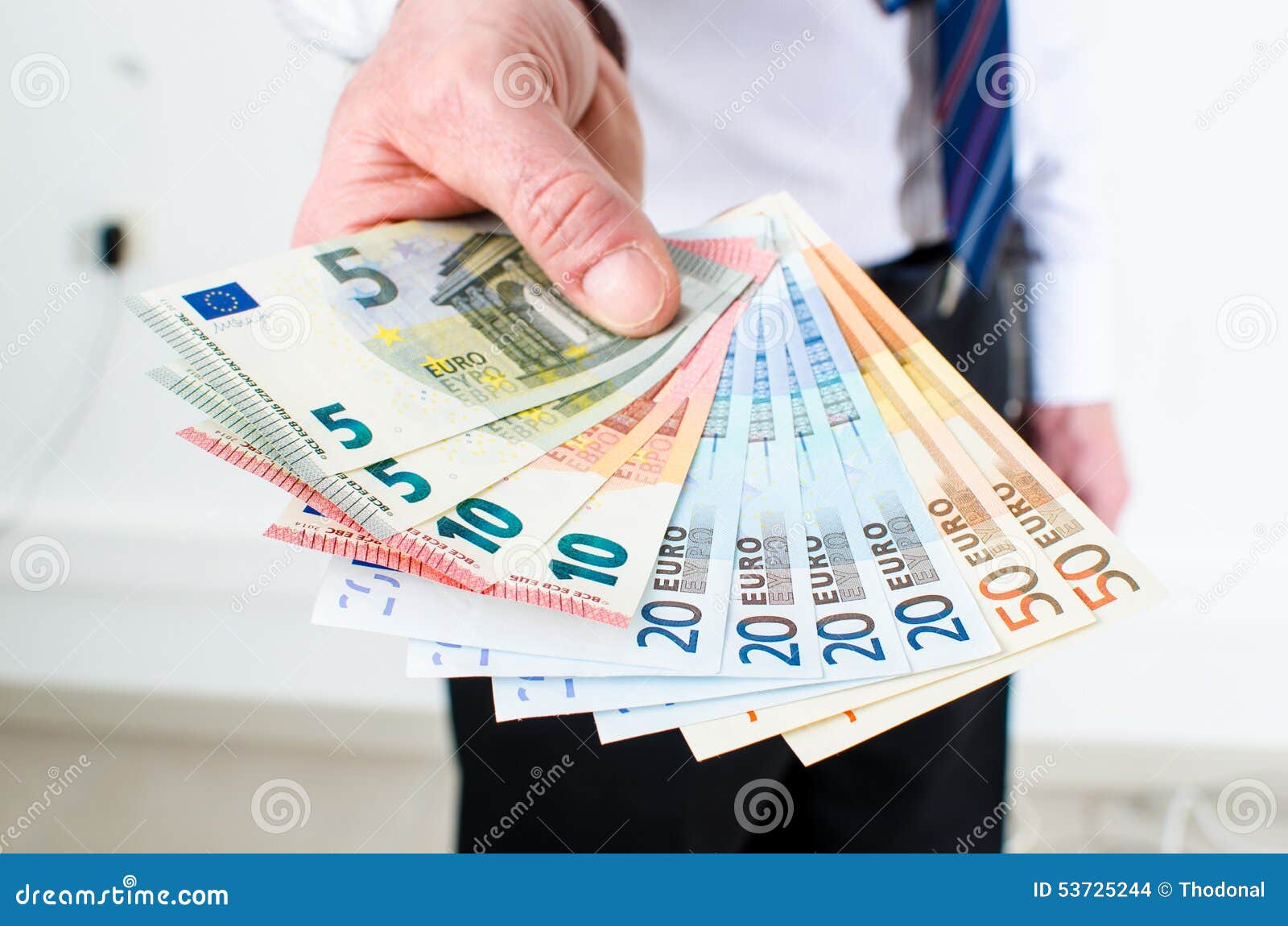 Man Hand Holding Euro Notes Stock Photo - Image of money, bank: 53725244