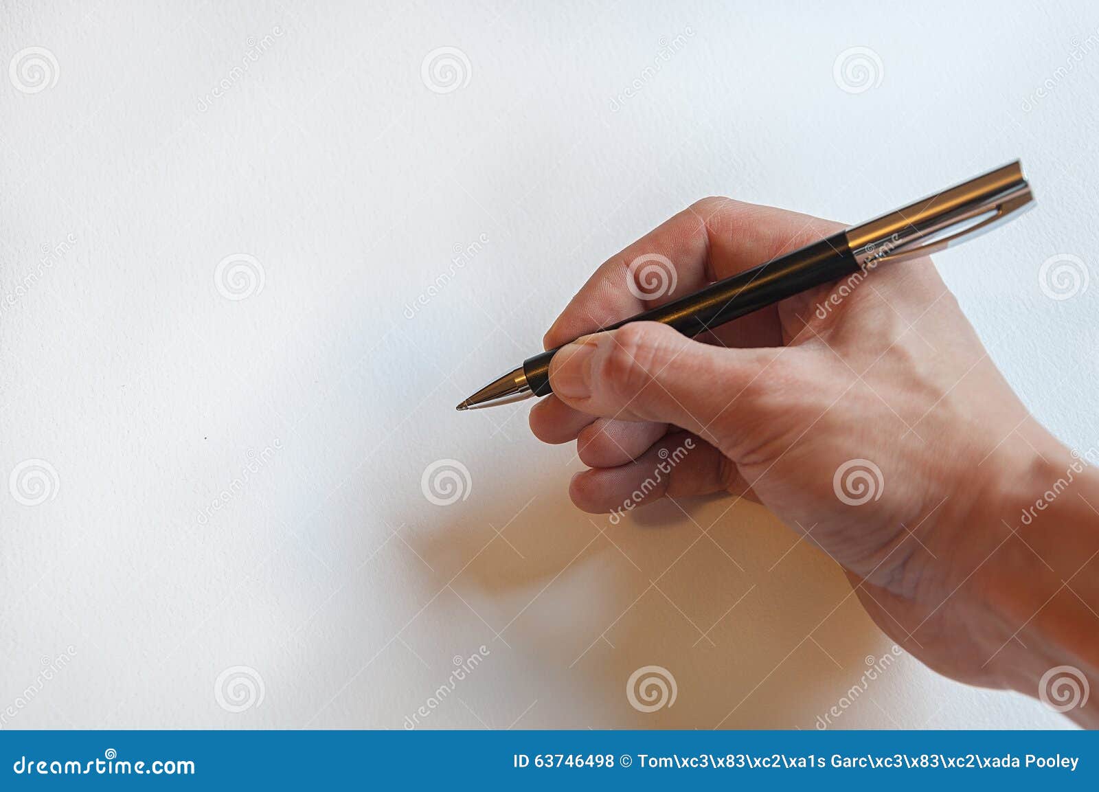 Man hand holding pen stock photo. Image of creation, critical - 63746498