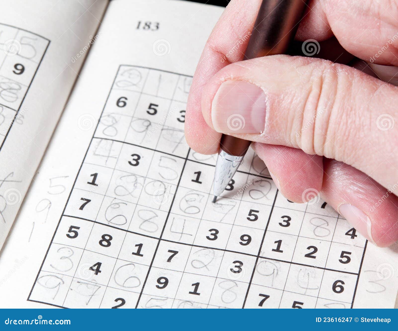 Man Hand Holding Pencil on Sudoku Puzzle Stock Image - Image of puzzle ...