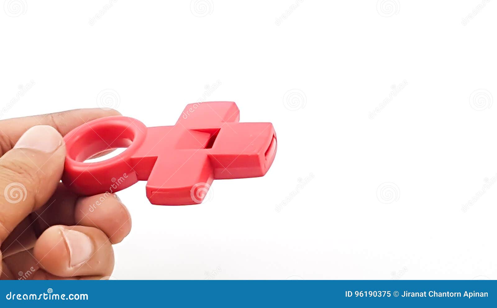 Man Hand Holding the Red Cross Whistle Stock Image - Image of hold ...