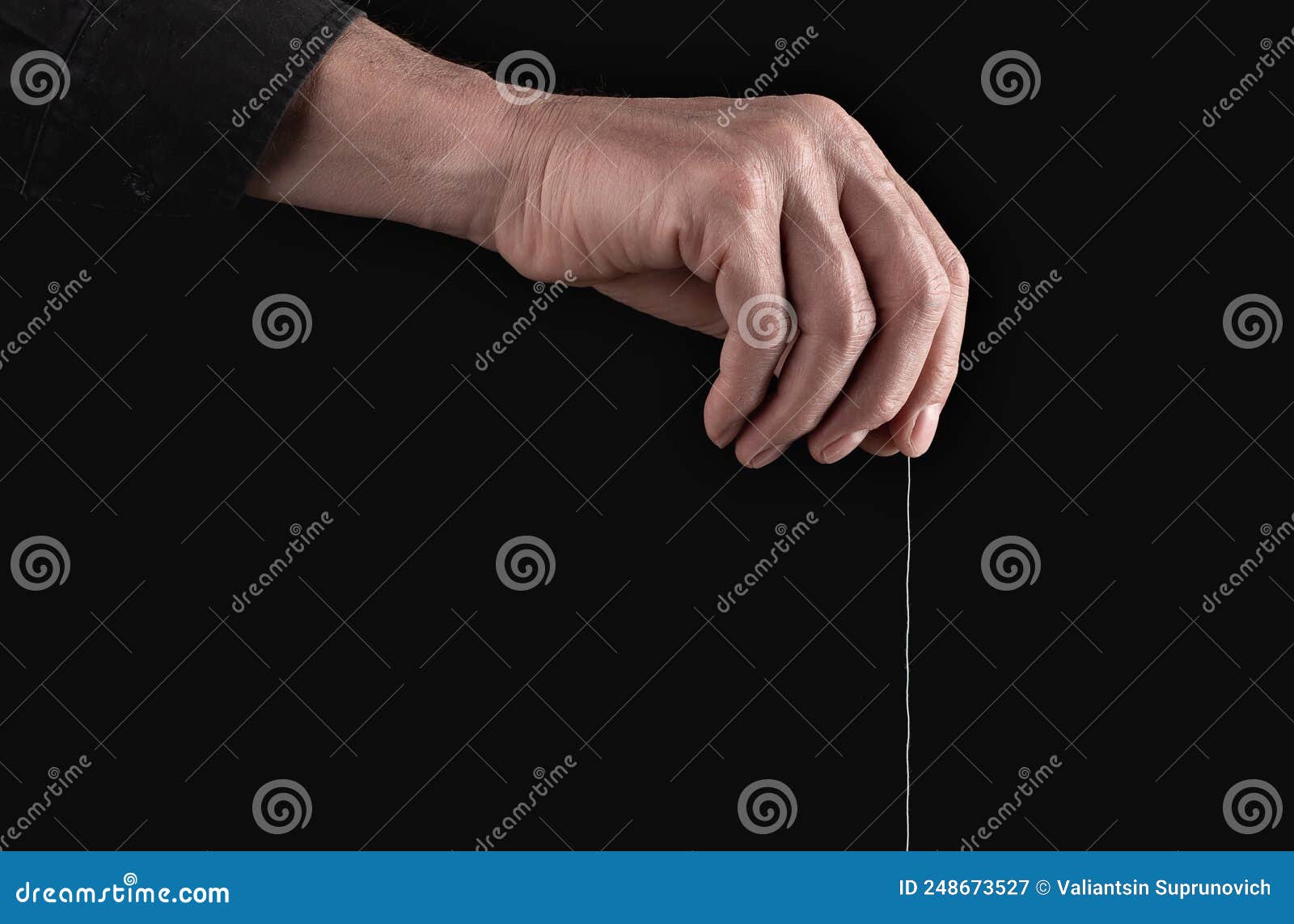 Man Hand Holding String for Manipulation, Exploit, Control. Abuse and ...