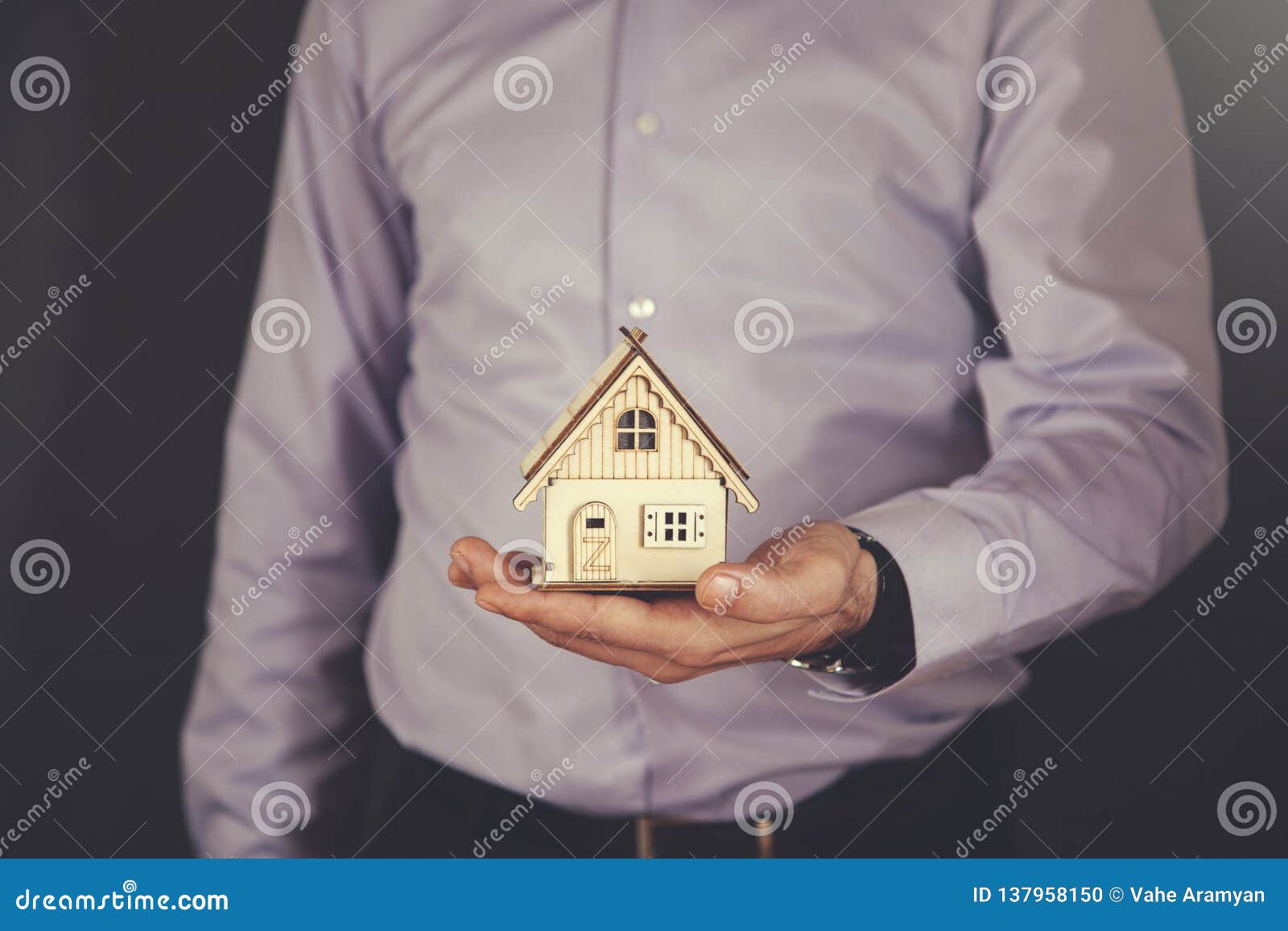 Man hand house model stock photo. Image of building - 137958150
