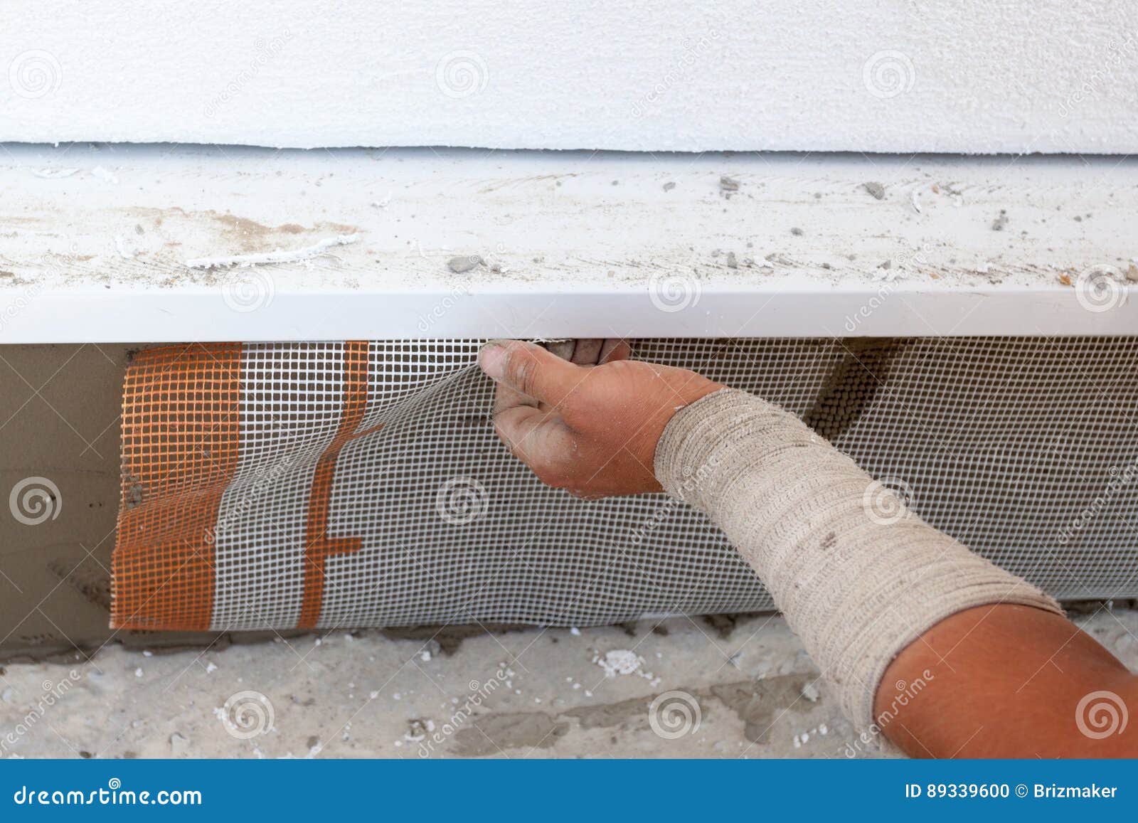 Man Hand Installing Mesh Over Plastering Foundation. Stock Photo ...