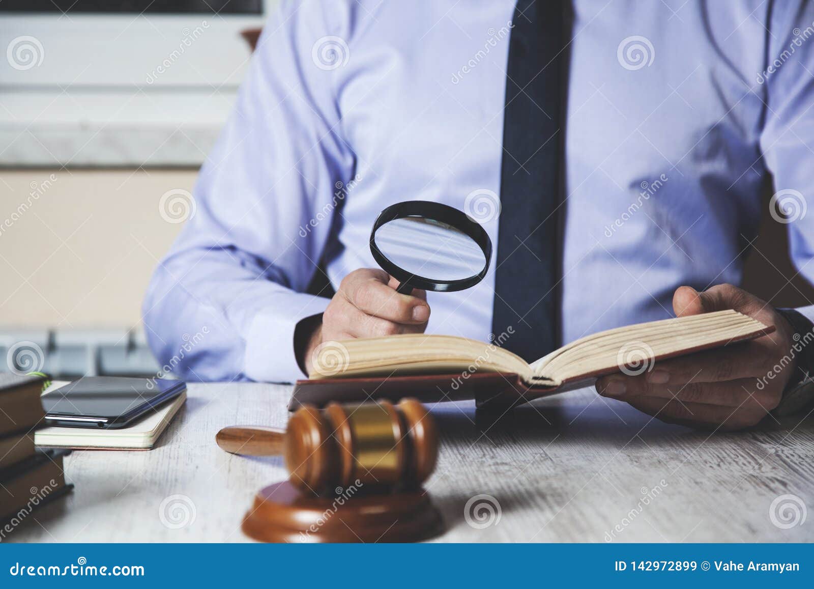 Man Hand Magnifier with Book with Judge Stock Image - Image of ...