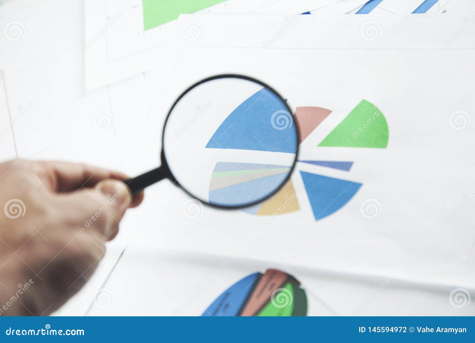Man hand magnifier stock photo. Image of office, table - 145594972