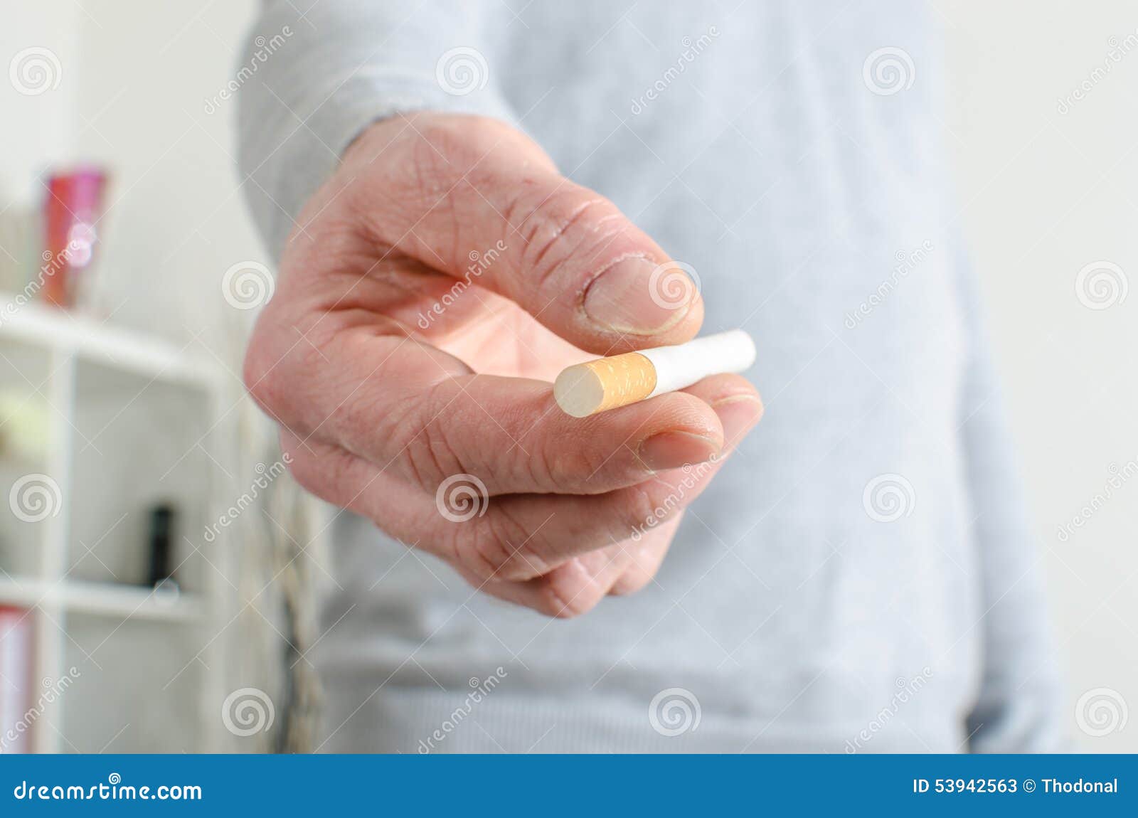 Man Hand Offering a Cigarette Stock Image - Image of offering ...