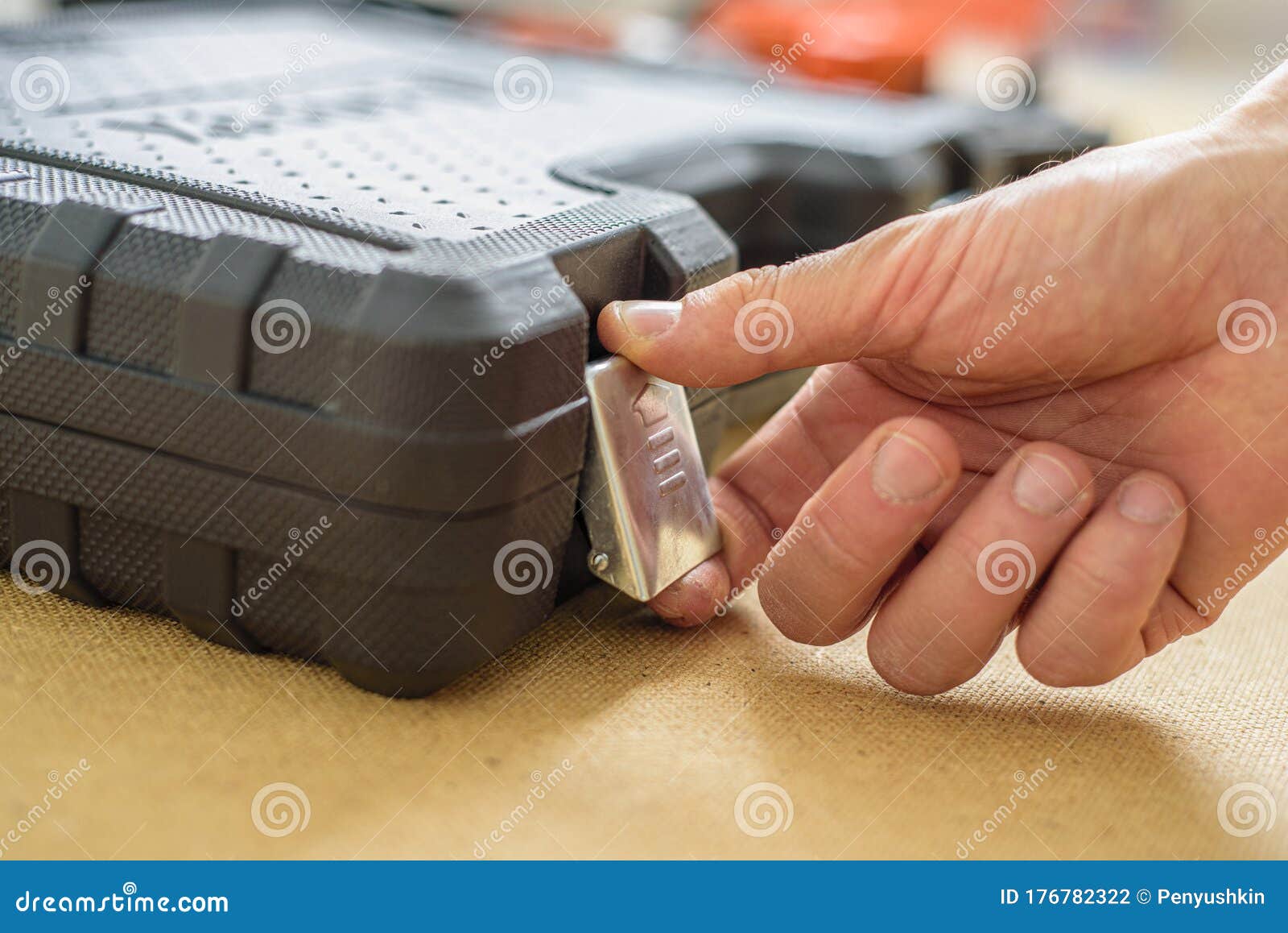 Man Hand Opening the Case with Tools. Stock Photo - Image of male ...