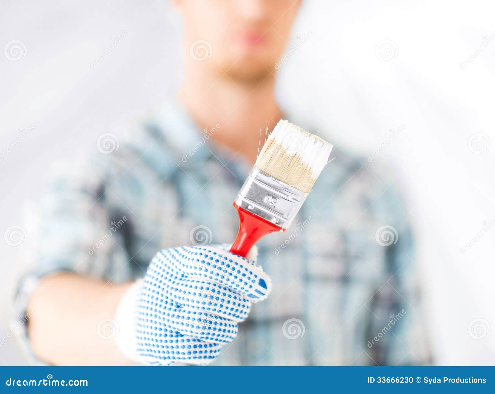 Man hand with paintbrush stock photo. Image of equipment - 33666230