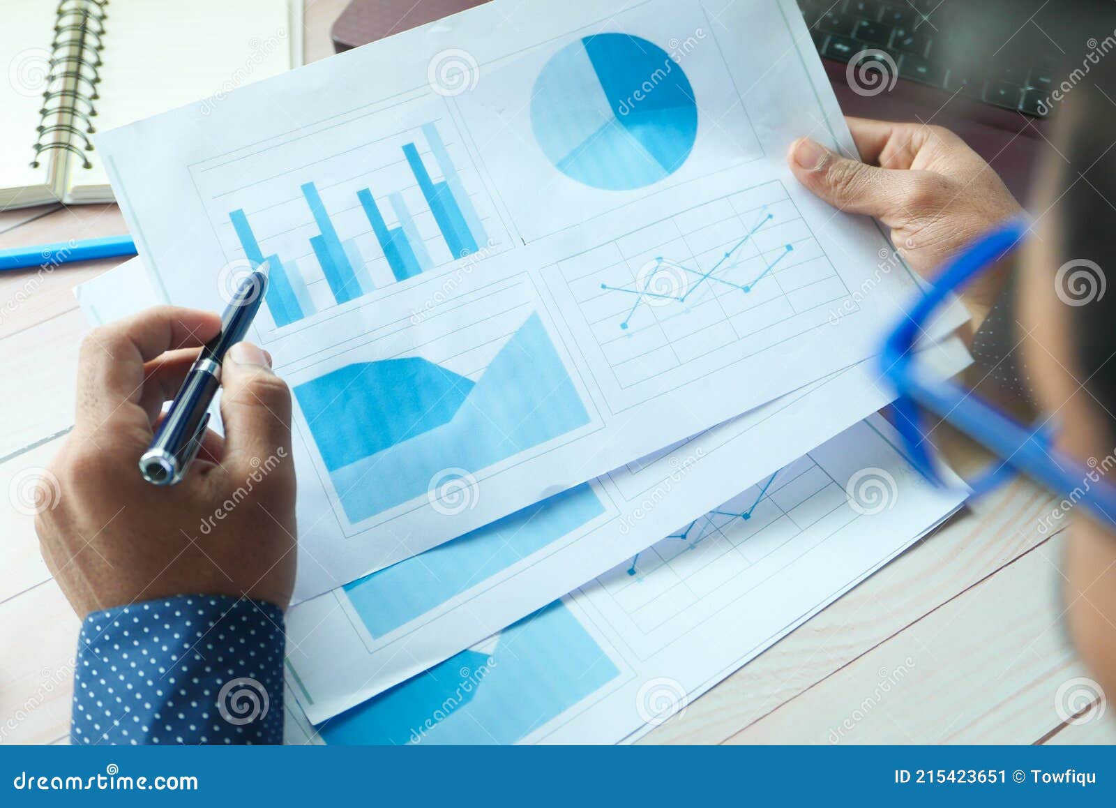 Man Hand with Pen Analyzing Bar Chart on Paper Stock Image - Image of ...