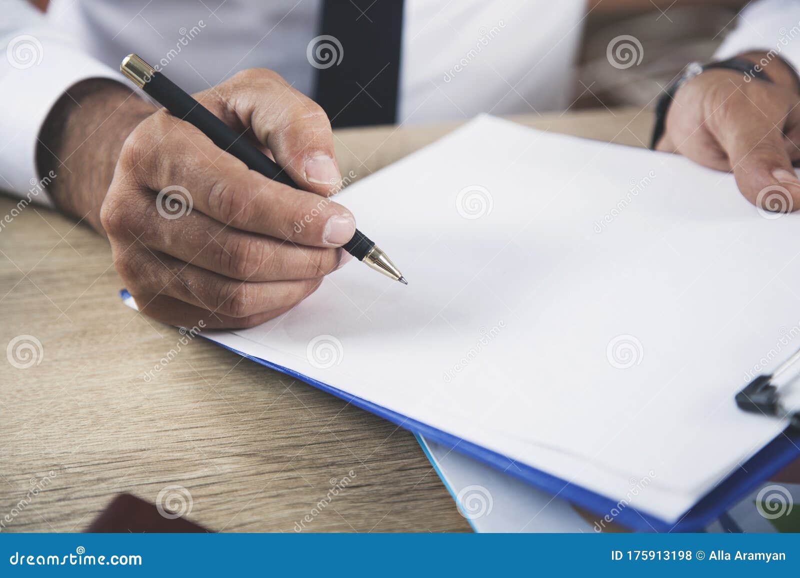 Man hand pen with document stock photo. Image of paperwork - 175913198