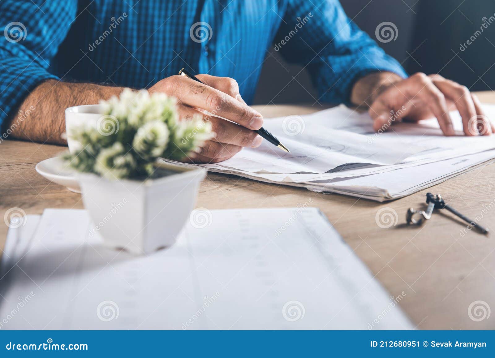 Man hand pen with drawings stock image. Image of plan - 212680951