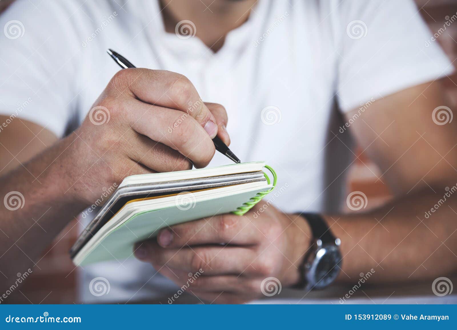 Man hand pen with notepad stock image. Image of businessman - 153912089