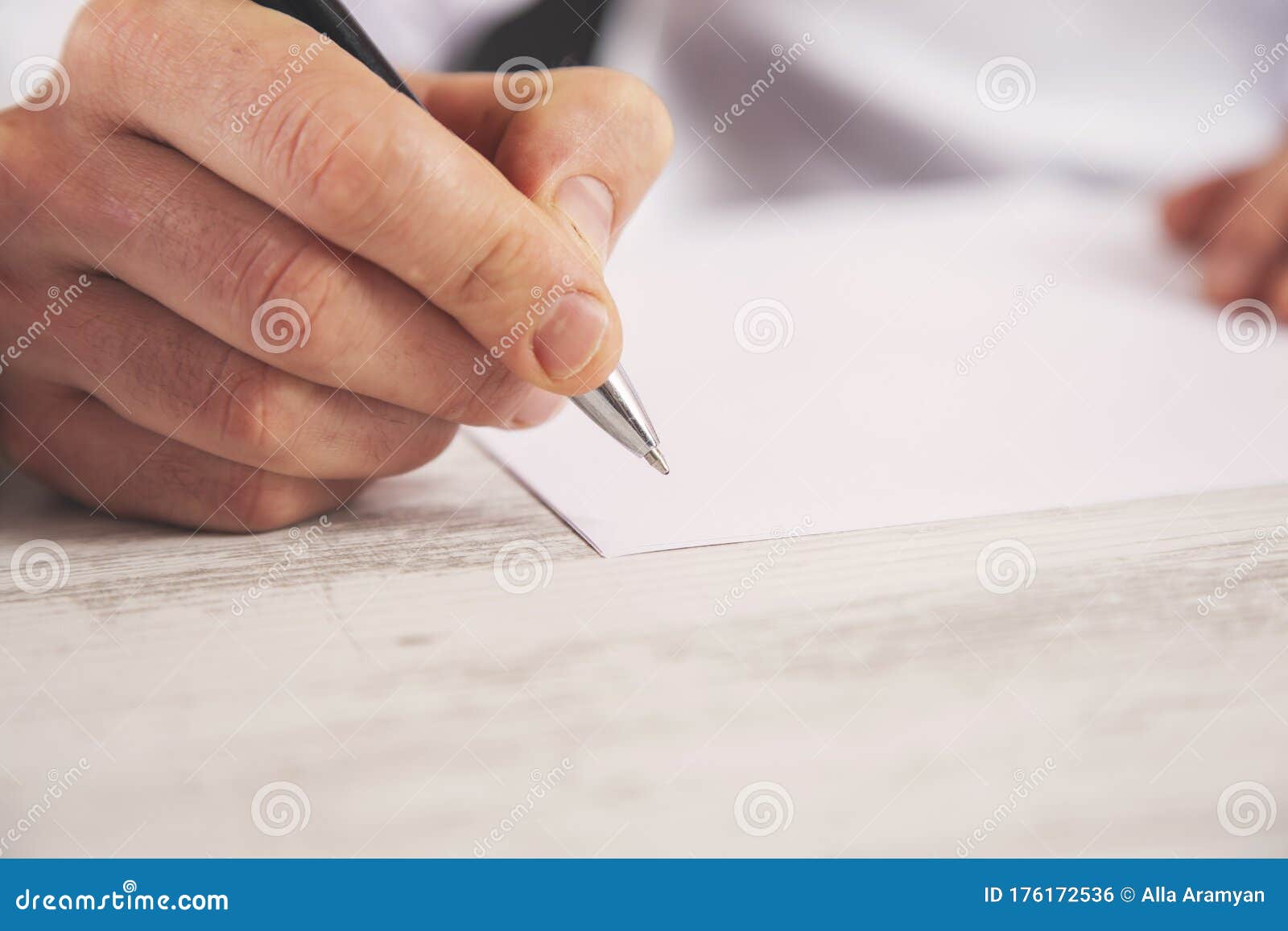Man hand pen and paper stock photo. Image of document - 176172536