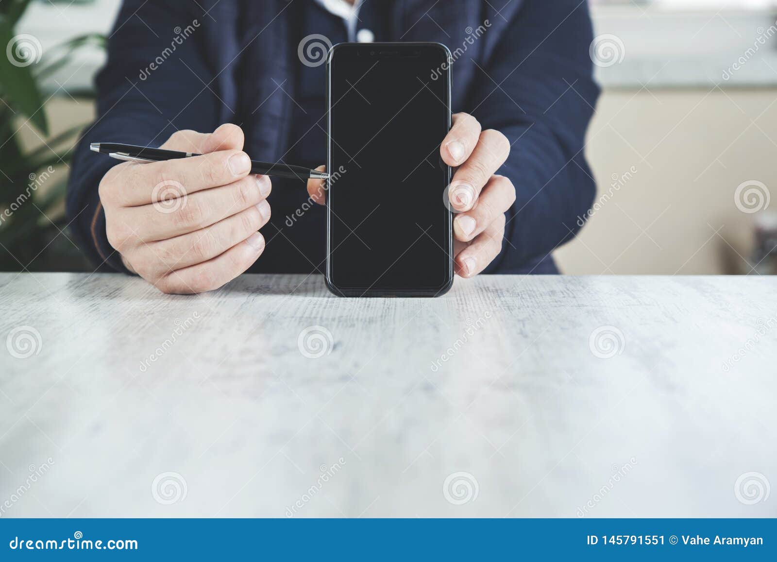 Man hand pen with phone stock image. Image of hand, businessman - 145791551