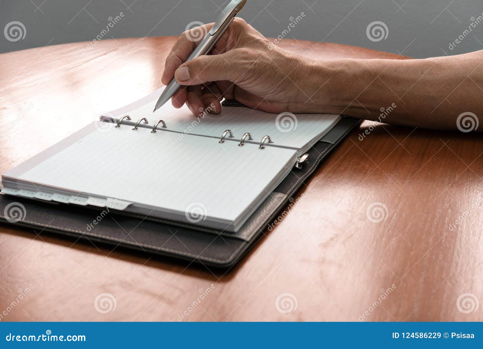 Man Hand with Pen Writing Note on Notebook at Office Stock Image ...