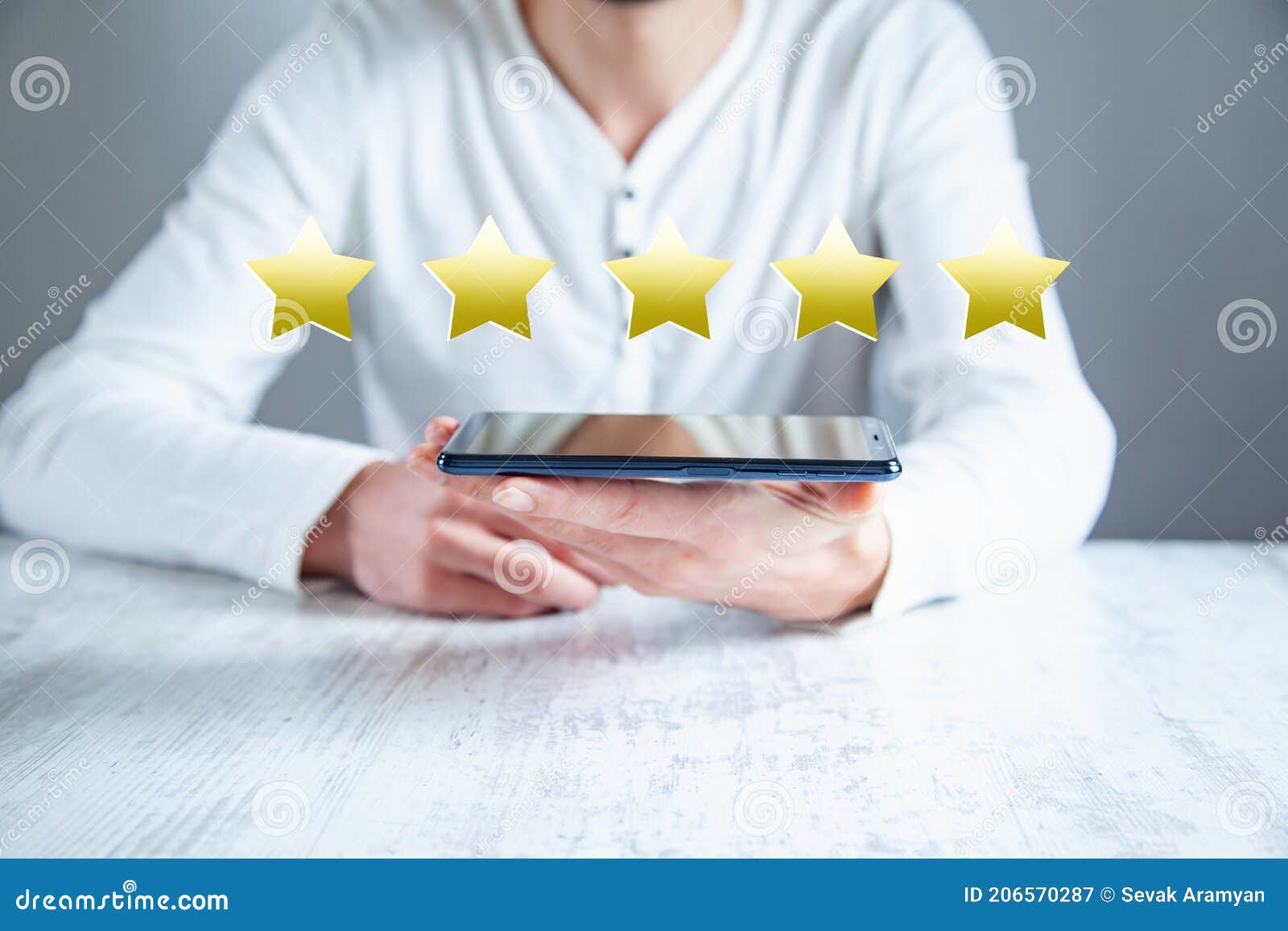 Man hand phone with stars stock image. Image of concept - 206570287