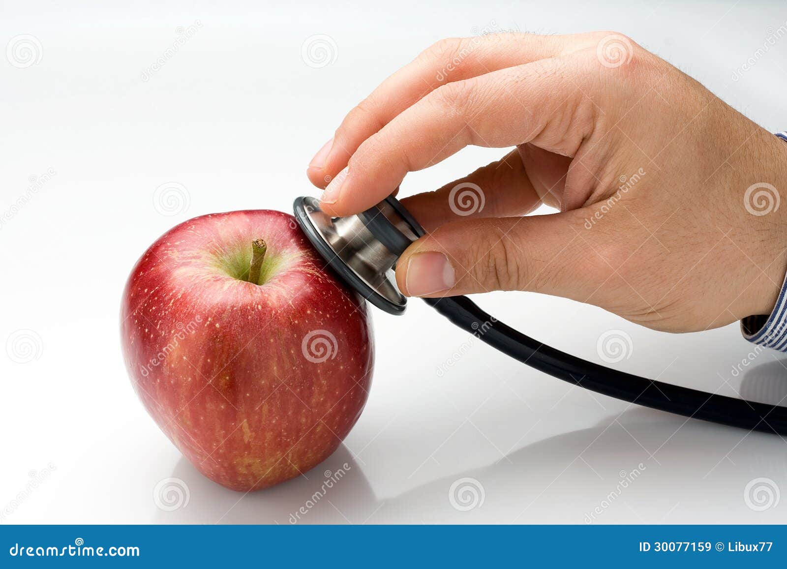 Doctor Examining Red Apple stock image. Image of healty - 30077159