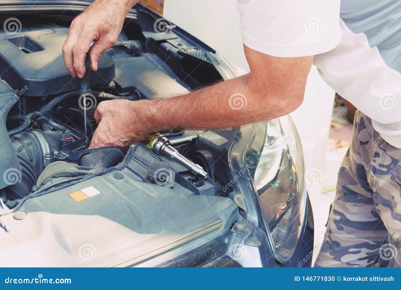 Man Hand with Screwdriver Checking Car Engine Stock Photo - Image of ...